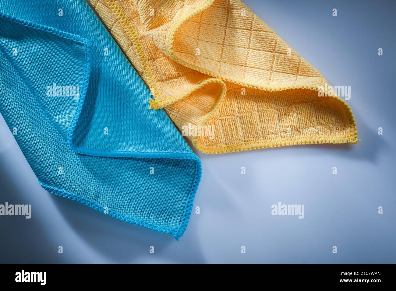 Cleaning clothes on white background Stock Photo - Alamy