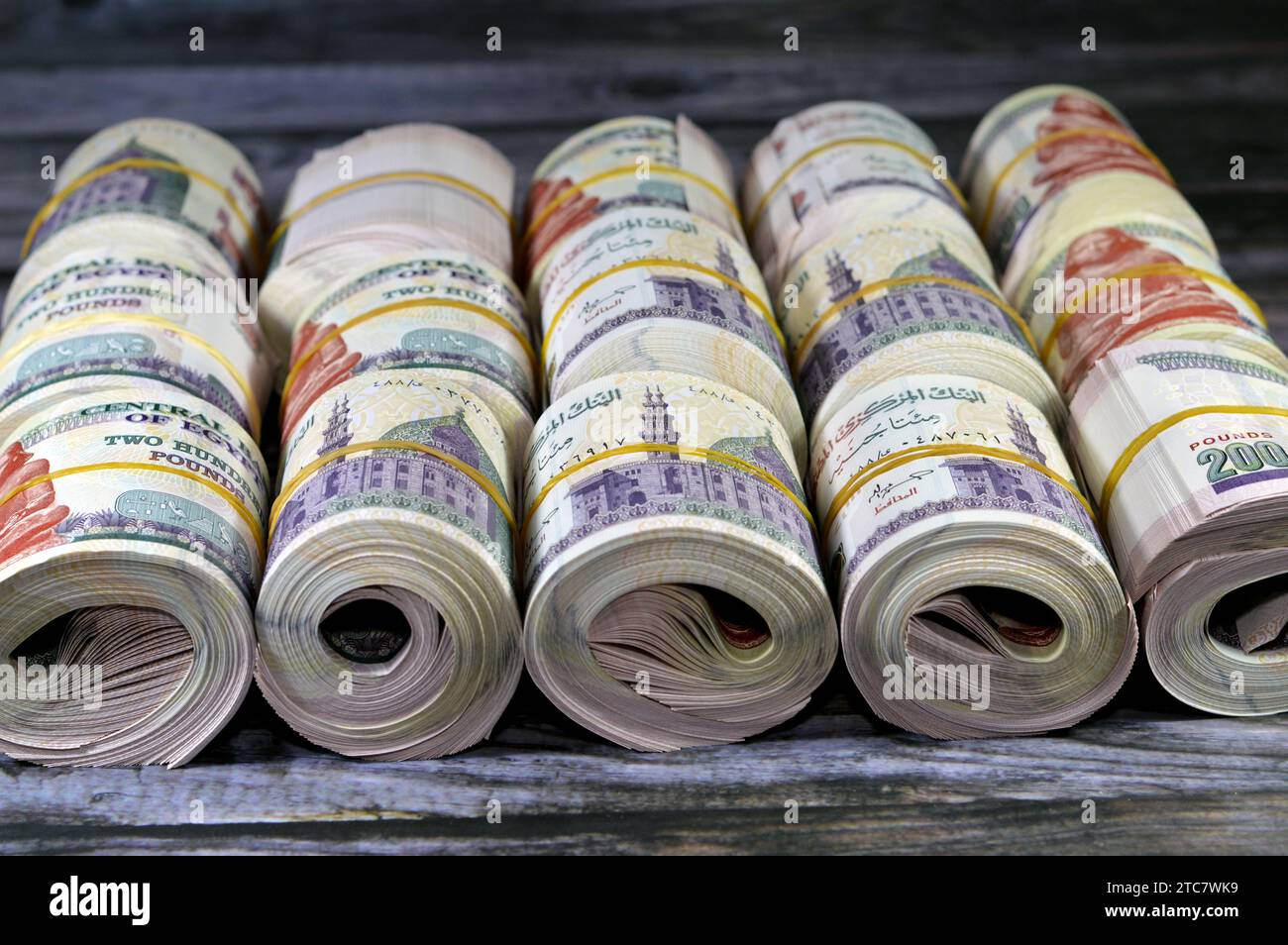Piles and bundles rolls of Egypt money thousands of Pounds currency ...