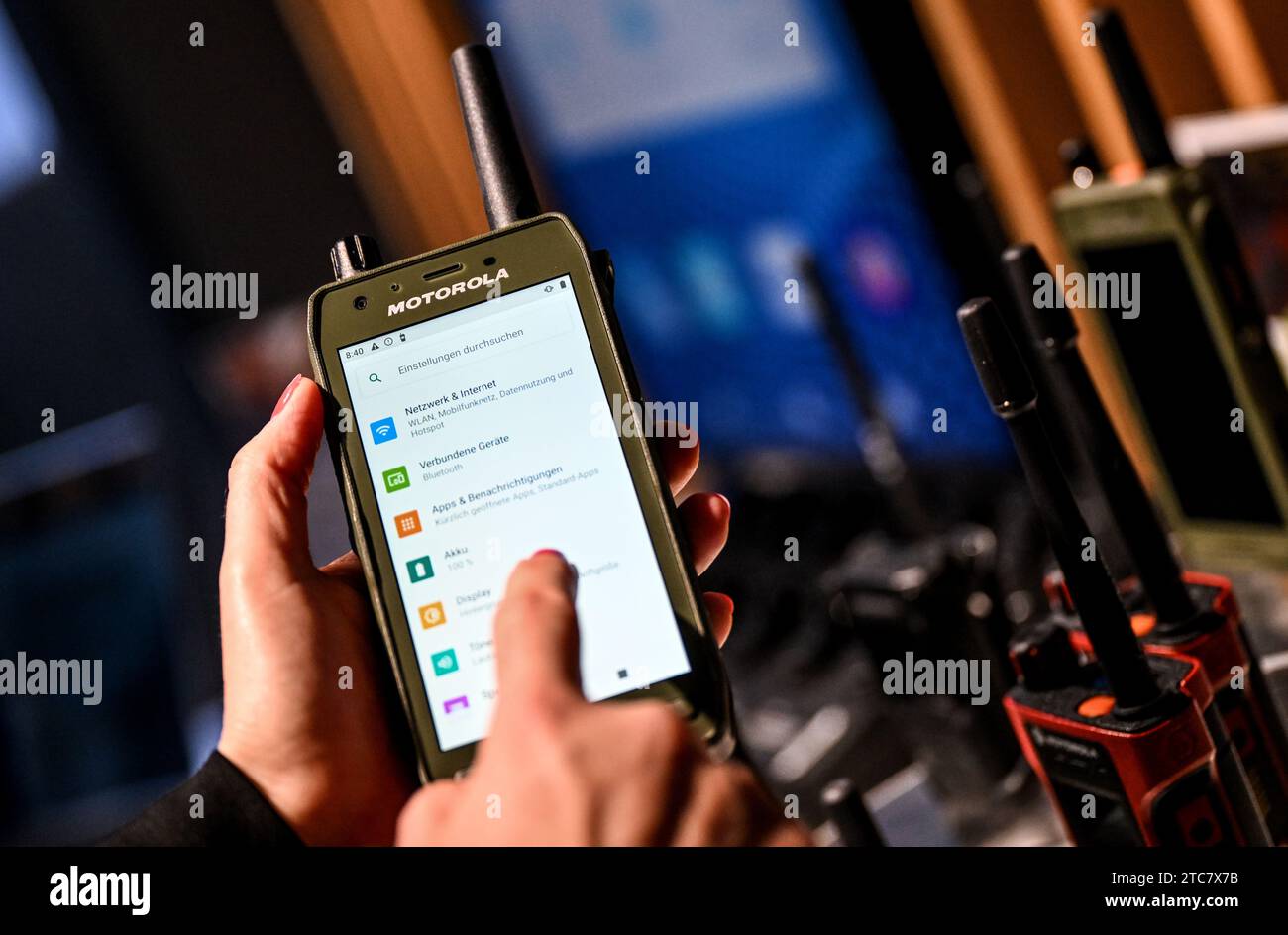 Berlin, Germany. 11th Dec, 2023. A young woman shows the LTE-capable ...