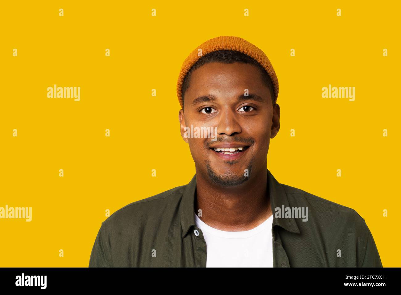 African Man Student In Basic Green Shirt Portrait Isolated On Trendy ...