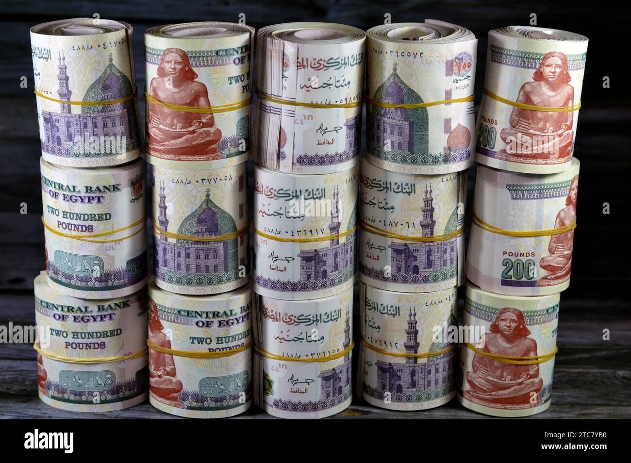 Piles and bundles rolls of Egypt money thousands of Pounds currency ...