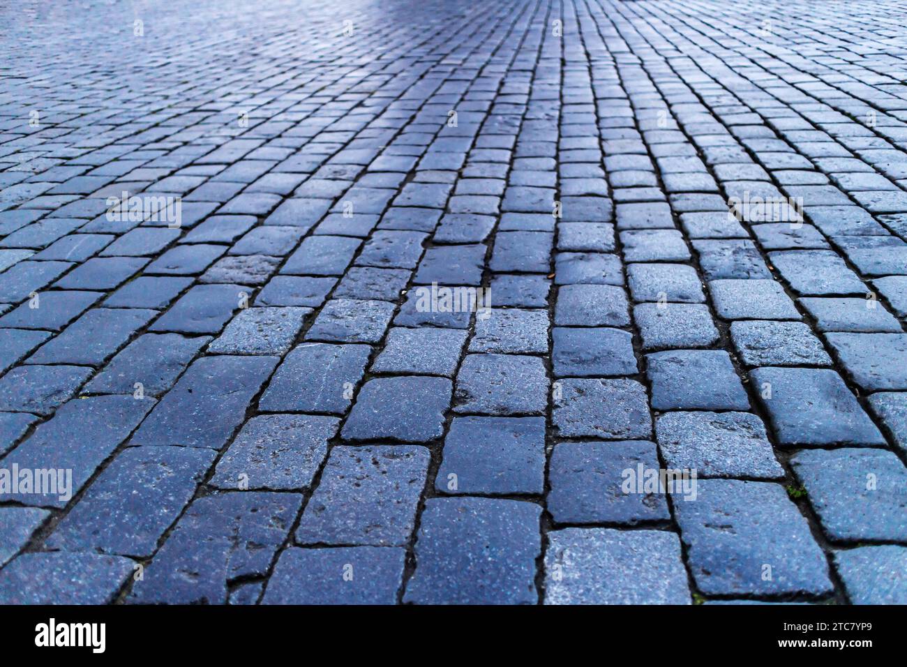 Smooth antique paving stones in perspective Stock Photo - Alamy
