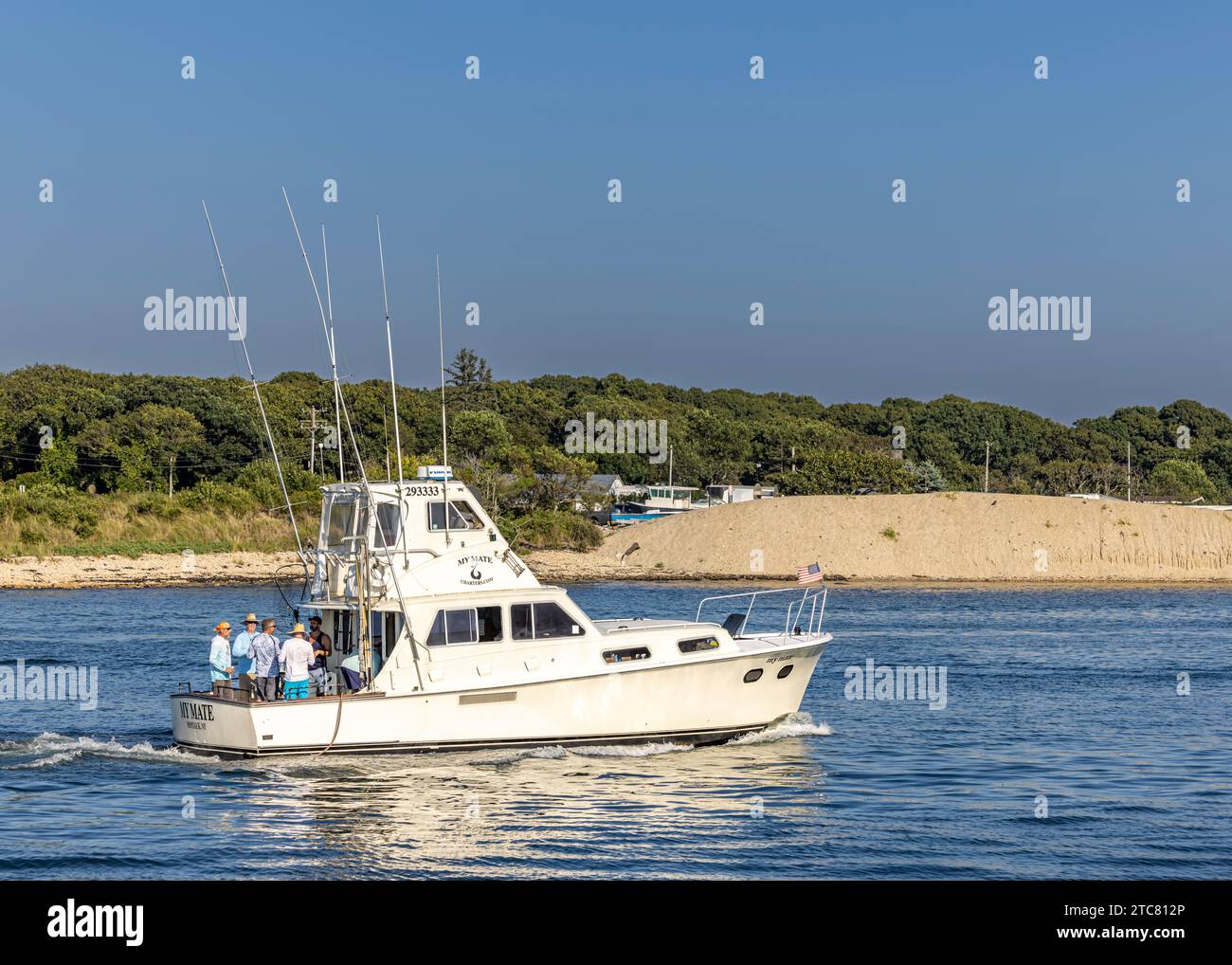 group of men on a fishing boat, my mate coming into montauk Stock Photo ...