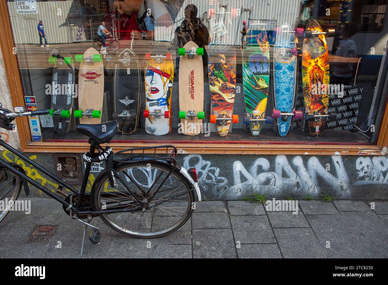 Painted skateboards in a shop window in Amsterdam Stock Photo - Alamy