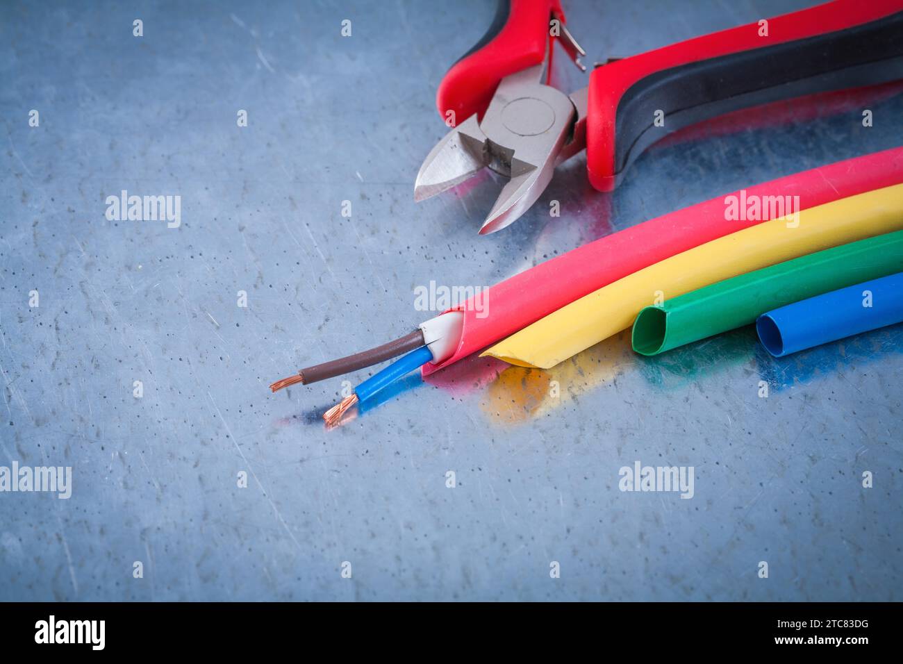 Wire protection copper cables sharp nippers on scratched metallic ...