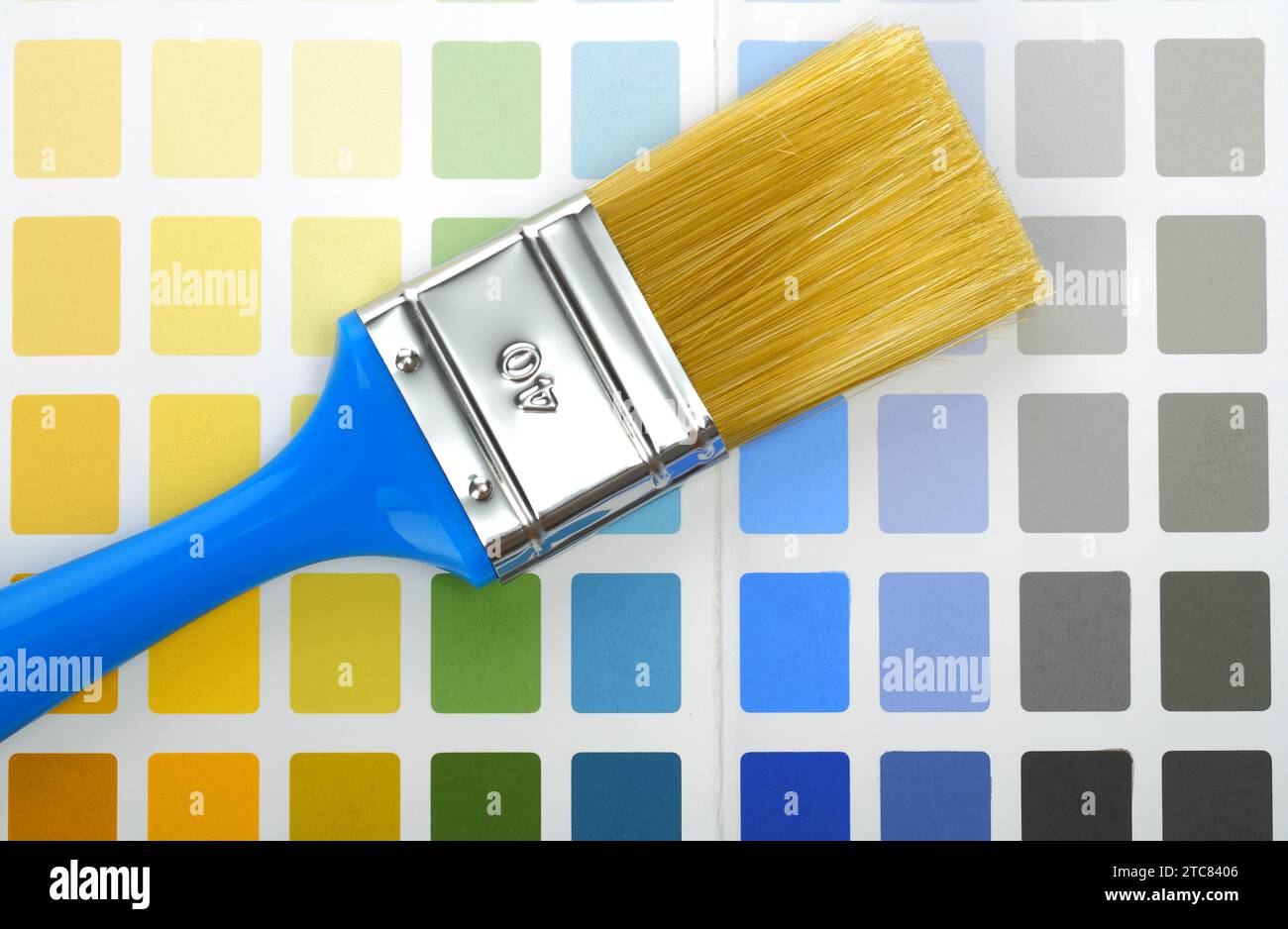 Paintbrush on color palette Stock Photo - Alamy