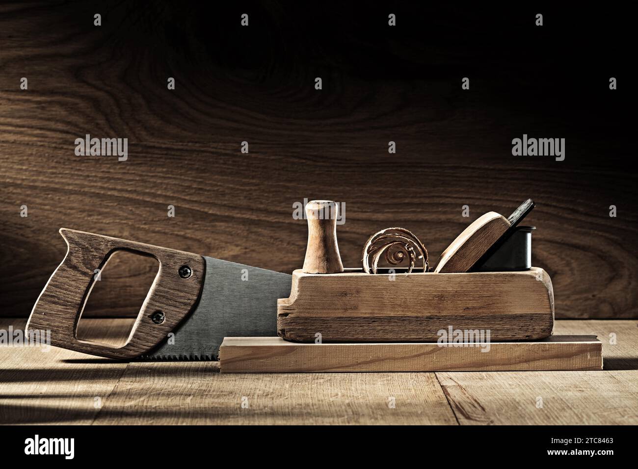 Vintage carpenter tools woodworkers hammer and handsaw Stock Photo - Alamy