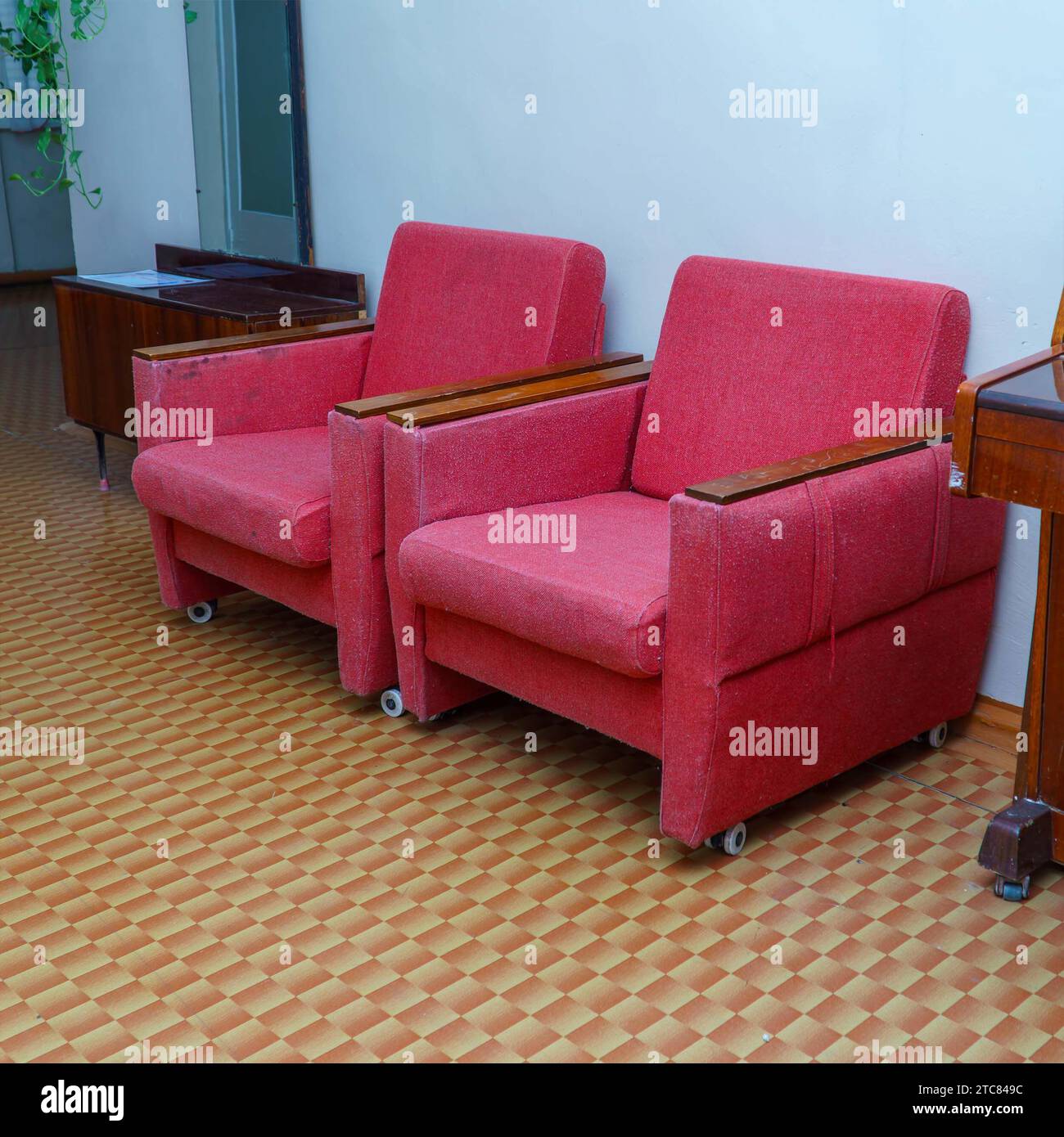 Old square chairs in the style of the 70s Stock Photo - Alamy