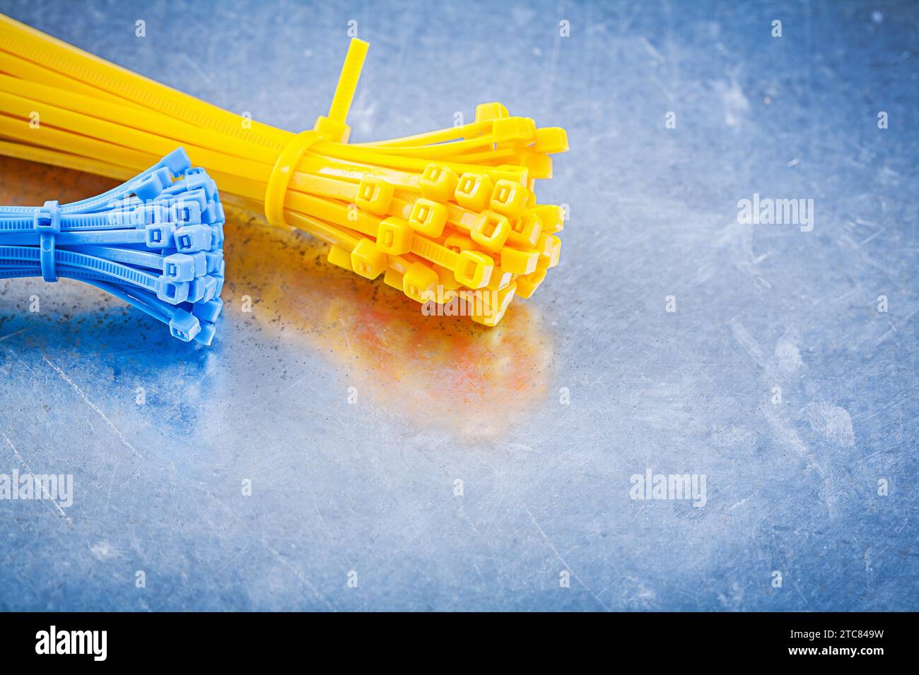 Bunch of tying cables on metallic background construction concept Stock ...