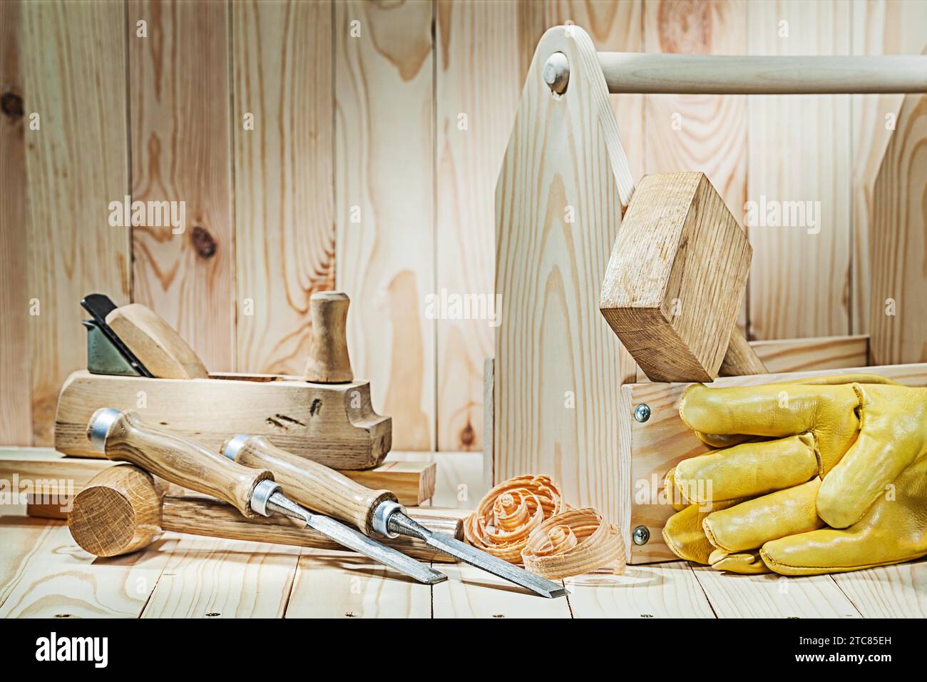 Set of carpenter tools with wooden toolbox on wood background Stock ...