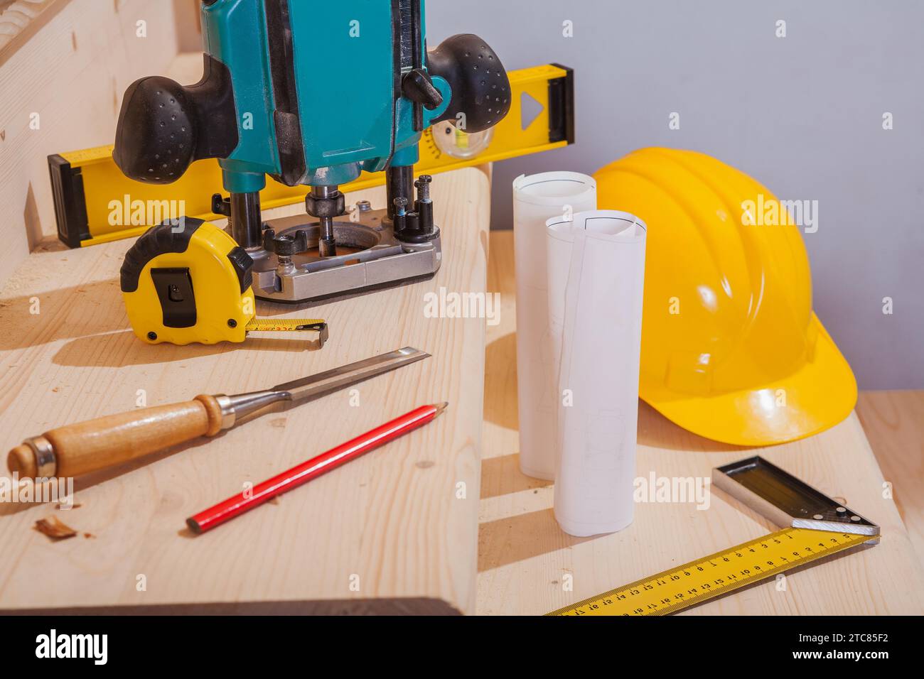 Set of carpenter tools on steps of wooden ladder Stock Photo - Alamy