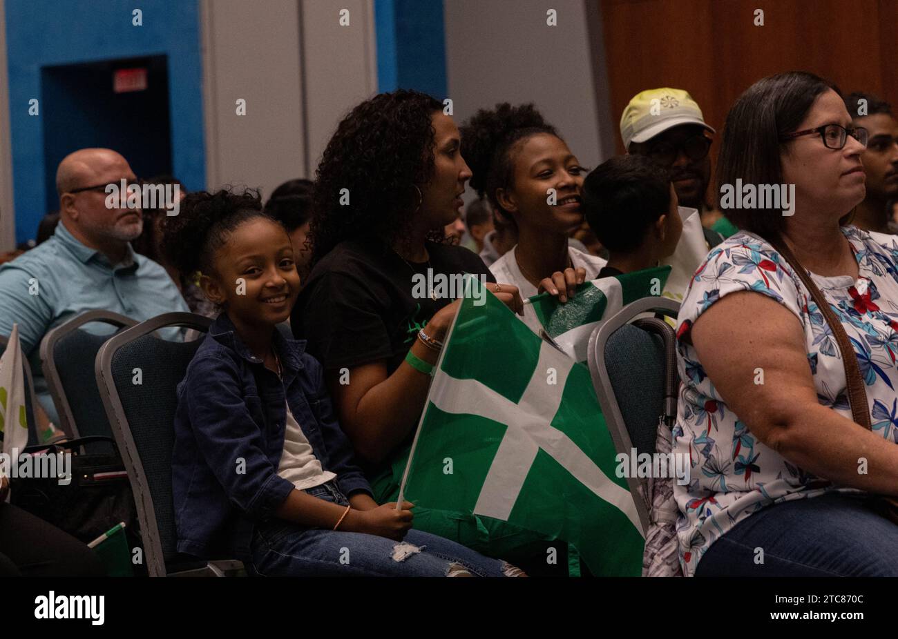 San Juan, USA. 10th Dec, 2023. A child holds the Puerto Rican ...