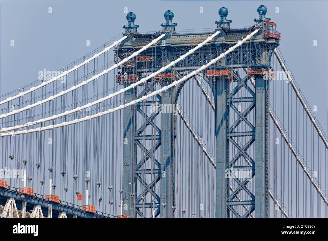 Massive steel towers support the Manhattan Bridge, one of three ...