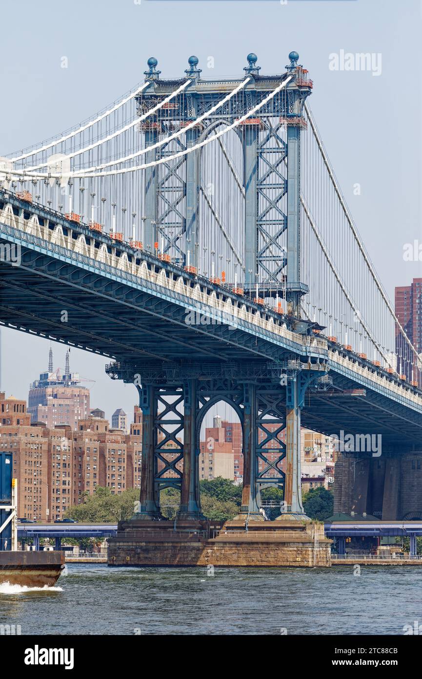 Massive steel towers support the Manhattan Bridge, one of three ...