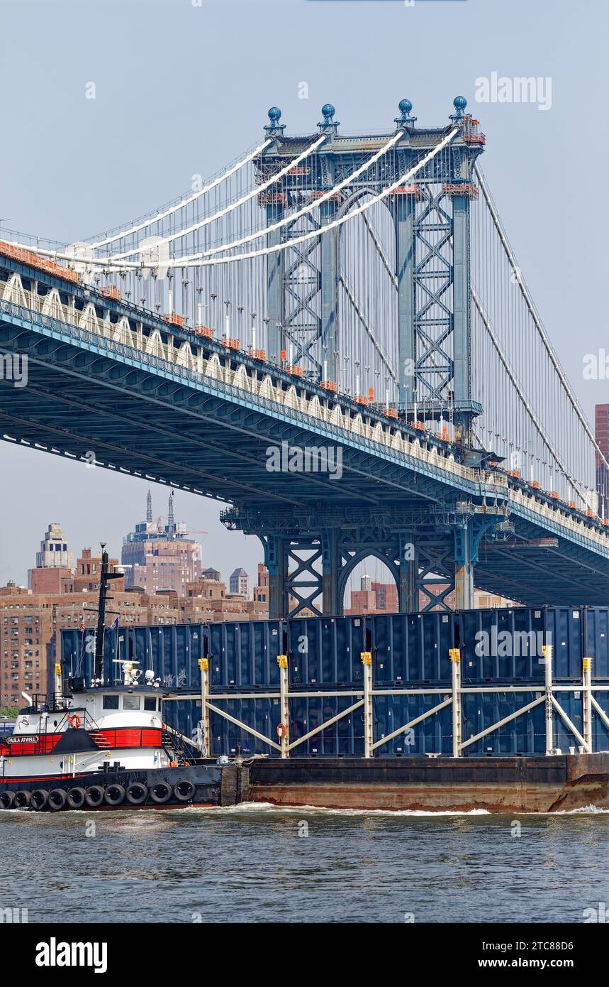Massive steel towers support the Manhattan Bridge, one of three ...