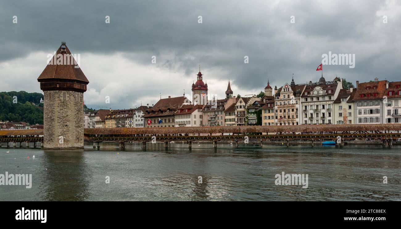 A picture of the city of Lucerne and the Reuss river, showcasing the ...