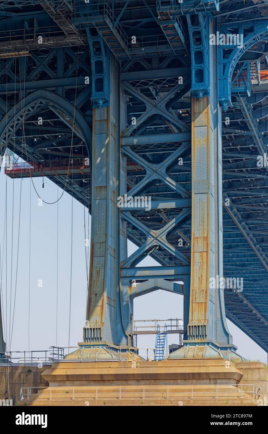 Massive steel towers support the Manhattan Bridge, one of three ...