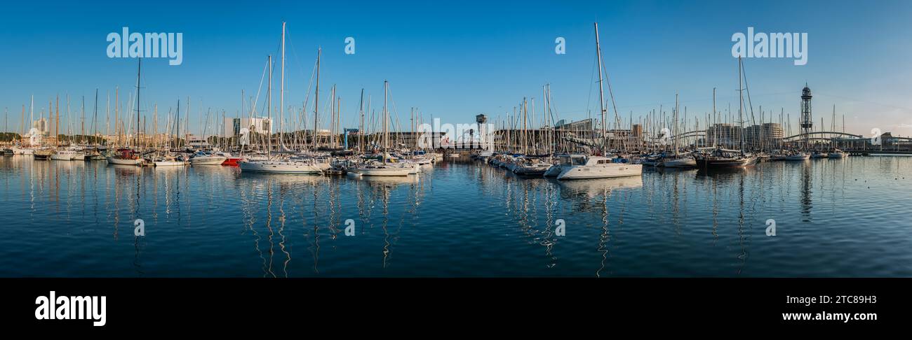A panorama picture of the Port Vell Marina with many docked boats Stock ...