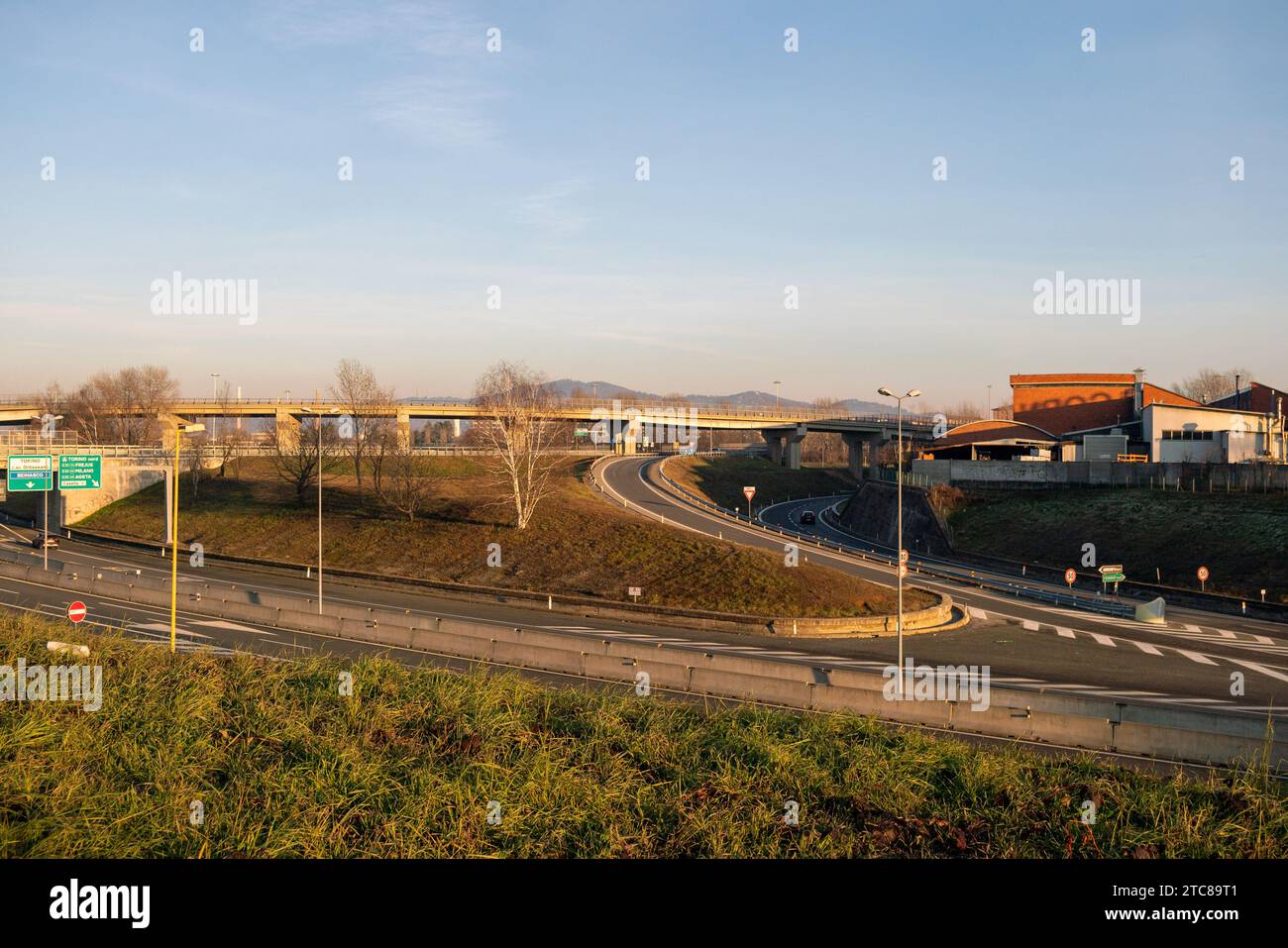 a motorway connection with overpass, which synergistically unites the ...