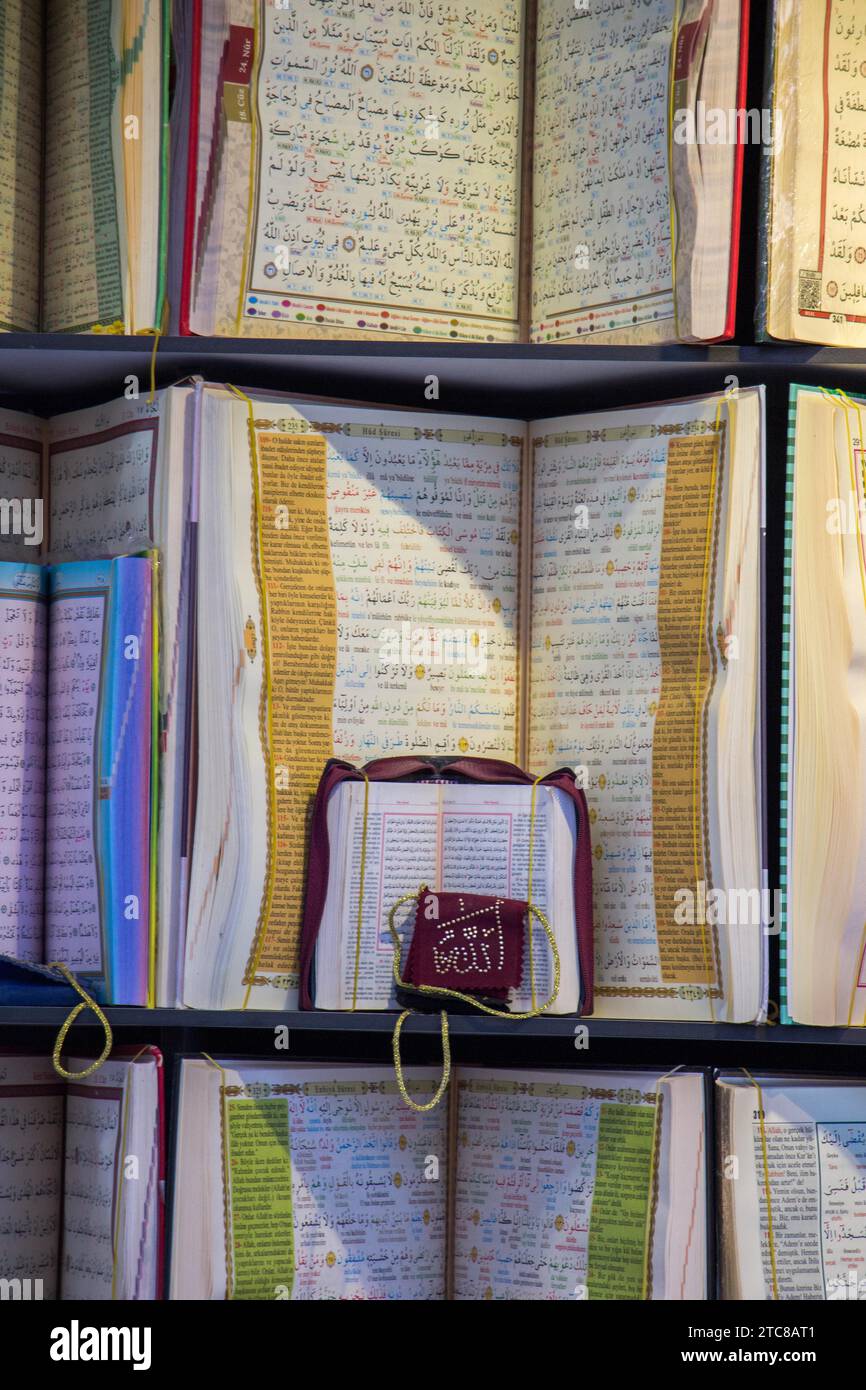 Islamic Holy Book Quran on the market shelf Stock Photo - Alamy
