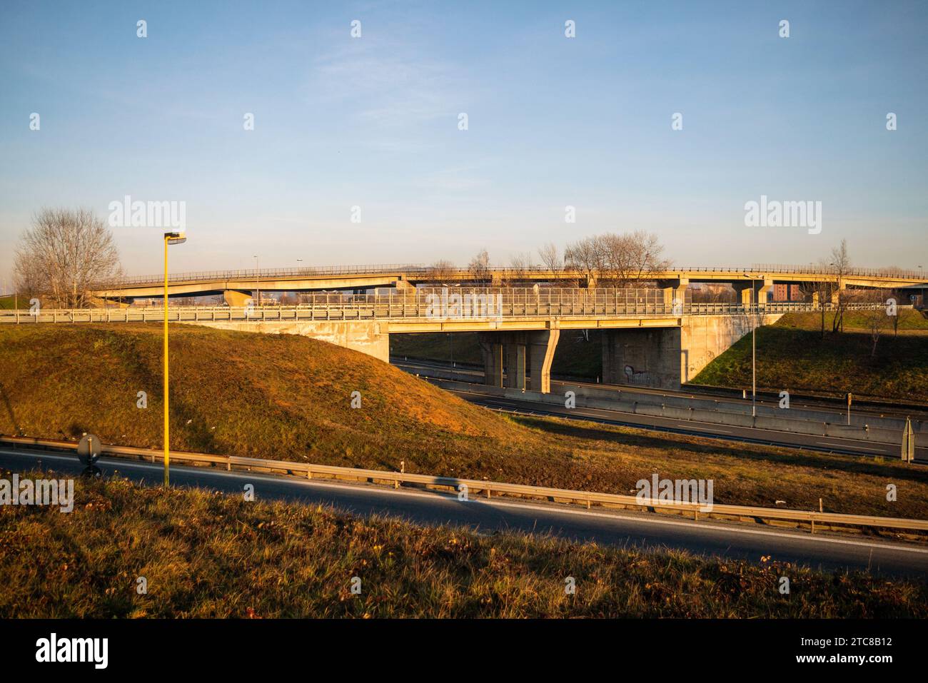 a motorway connection with overpass, which synergistically unites the ...