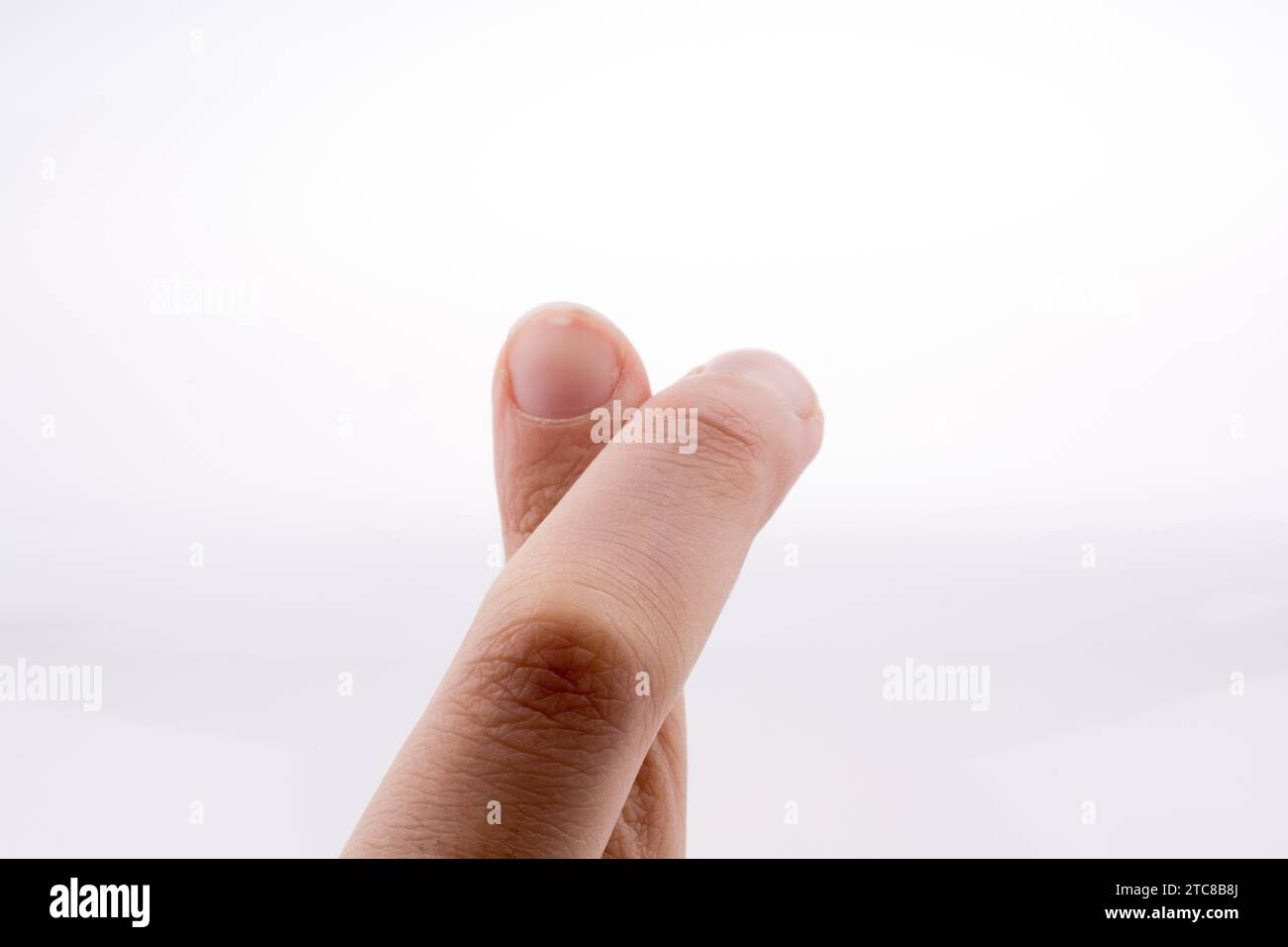 Cross finger hi-res stock photography and images - Alamy
