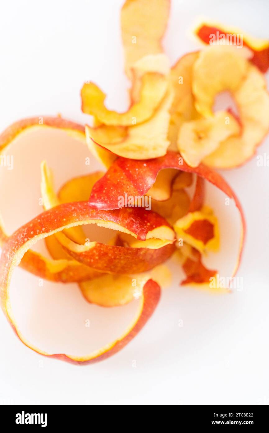 Peeling red apples Stock Photo - Alamy