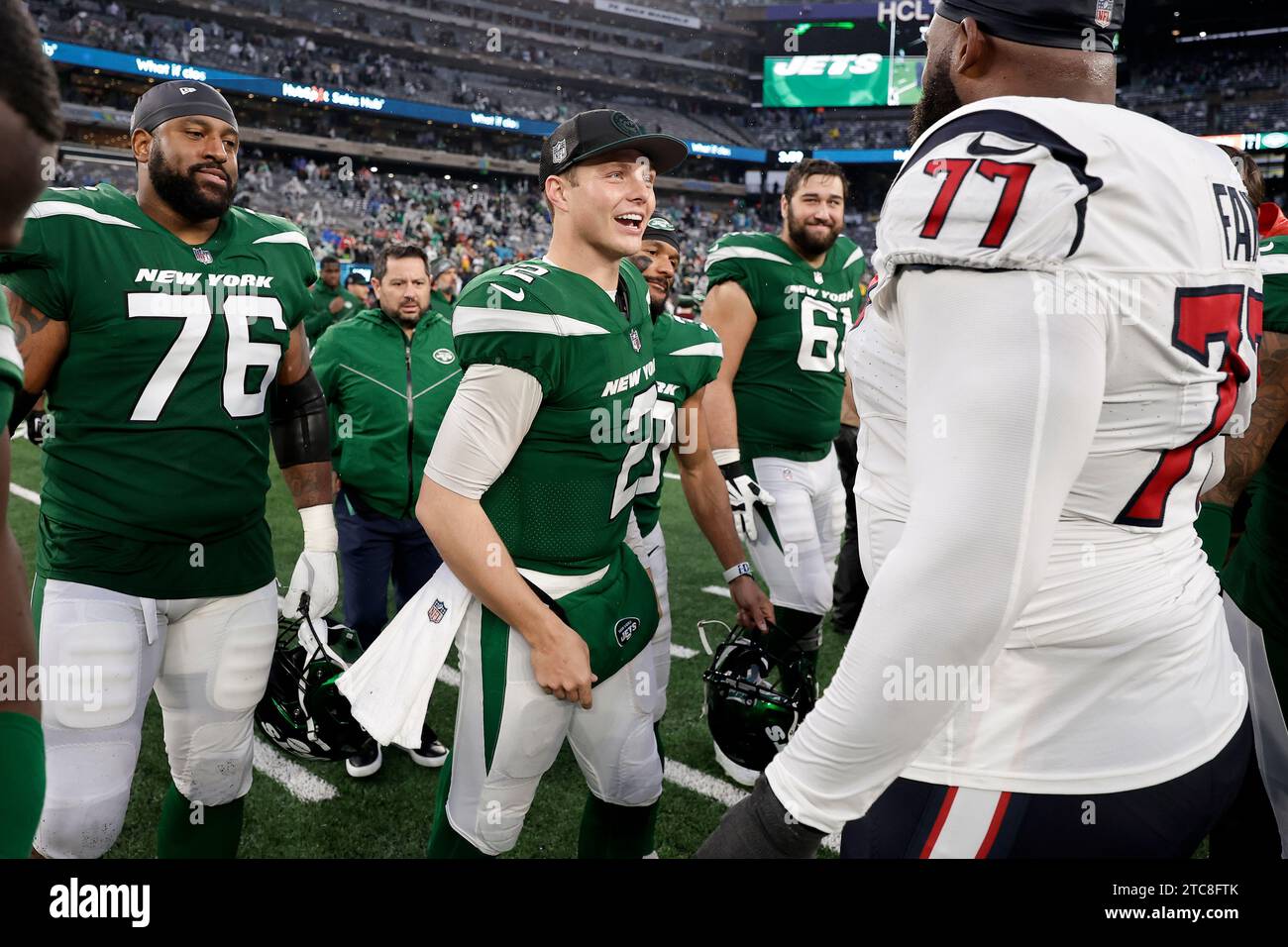 New York Jets quarterback Zach Wilson (2) greets Houston Texans ...
