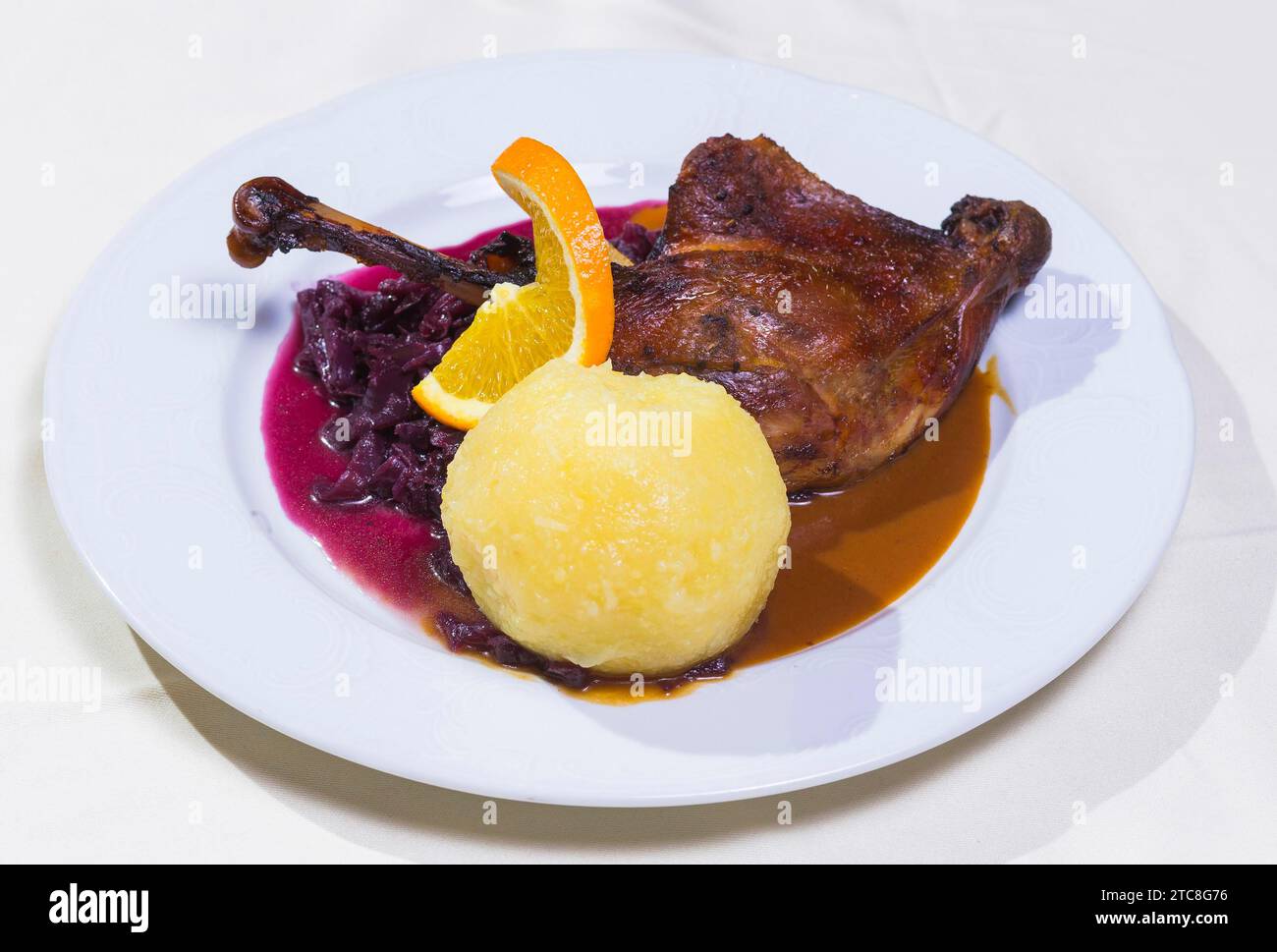 Duck with red cabbage and dumplings Stock Photo - Alamy