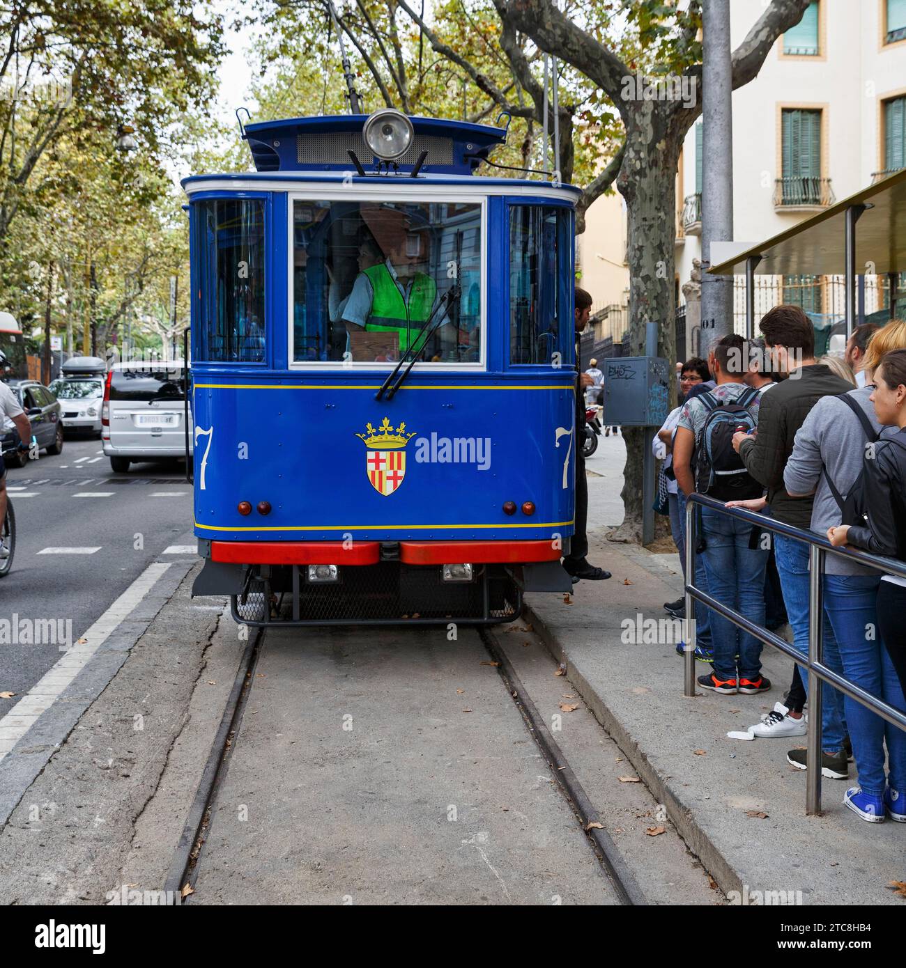 Nostalgic blue tram, tourist group waiting at the stop, Tramvia Blau ...