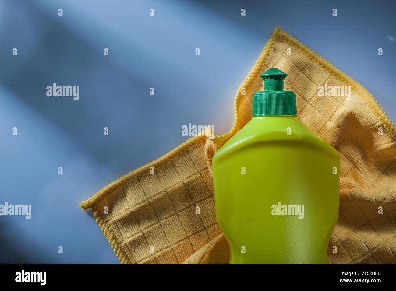 Plastic bottle cleaning cloth on white background Stock Photo - Alamy