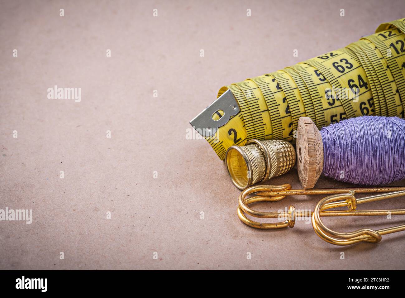 Measuring flexible ruler wooden thread spool safety pins thimbles Stock ...