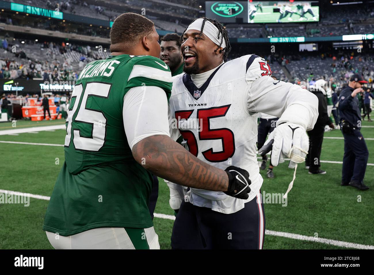 Houston Texans defensive end Jerry Hughes (55) greets New York Jets ...