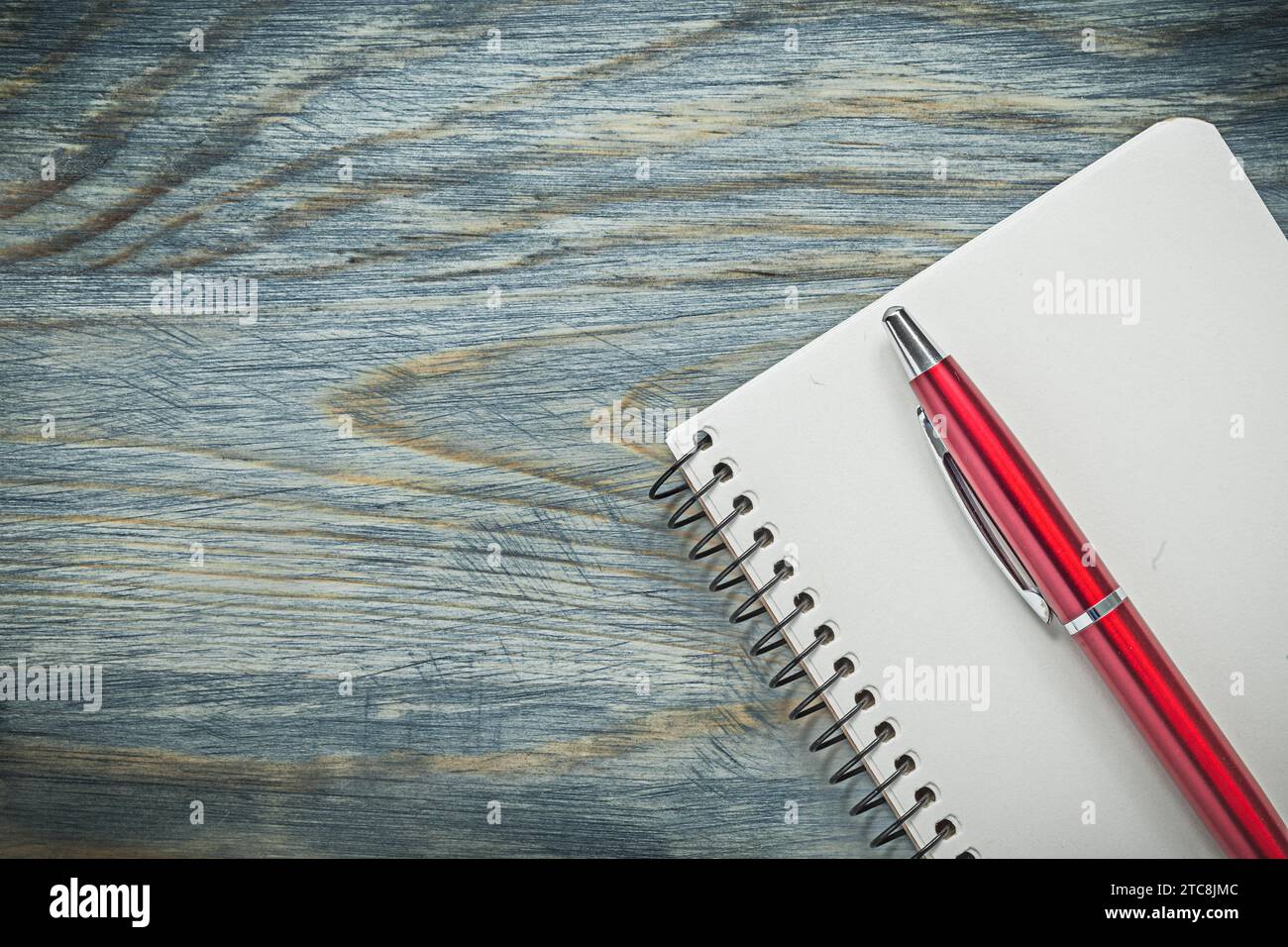 Set of biro pen blank notepad on wooden board office concept Stock ...