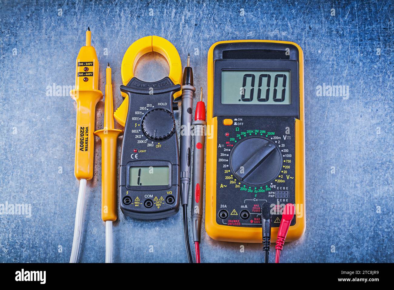 Set of digital ammeter electrical tester multimeter on metallic ...