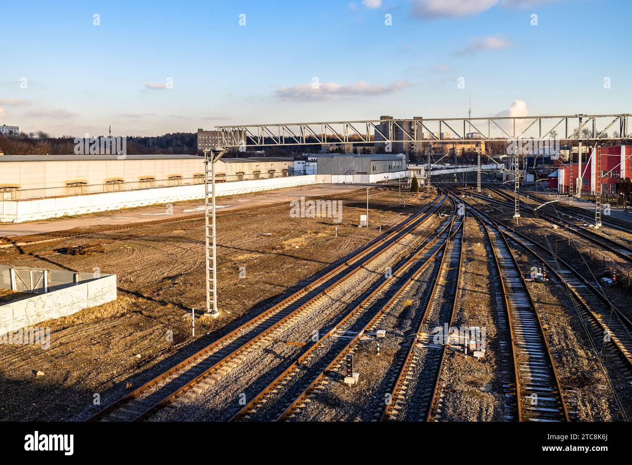 above view empty railroad tracks at railway siding illuminated by ...