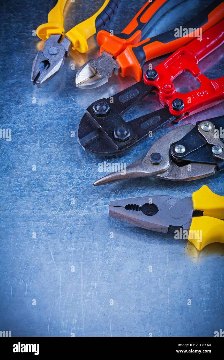Composition of bolt cutter tin snips cutting pliers gripping tongs on ...