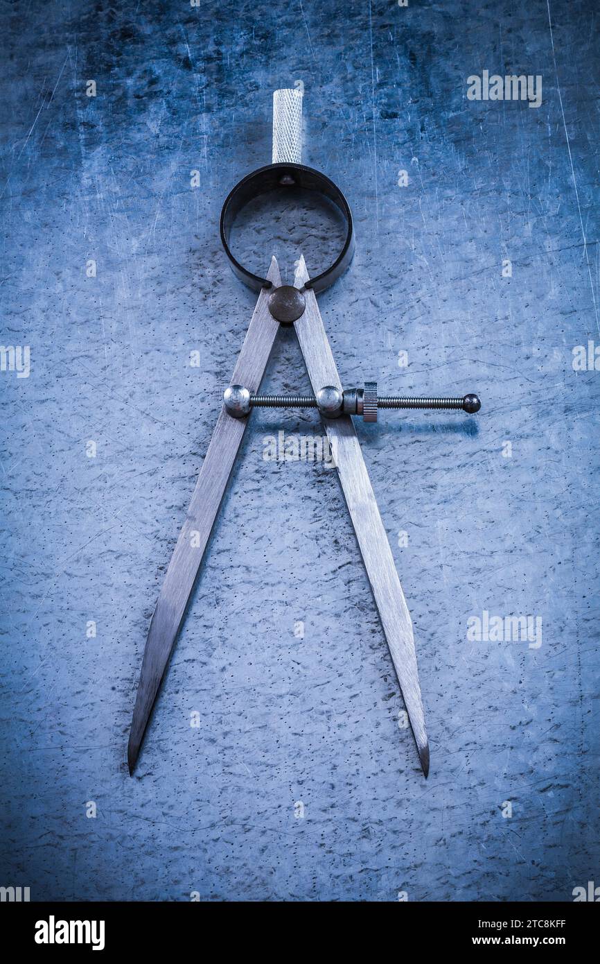 Construction divider on scratched metallic background top view image ...