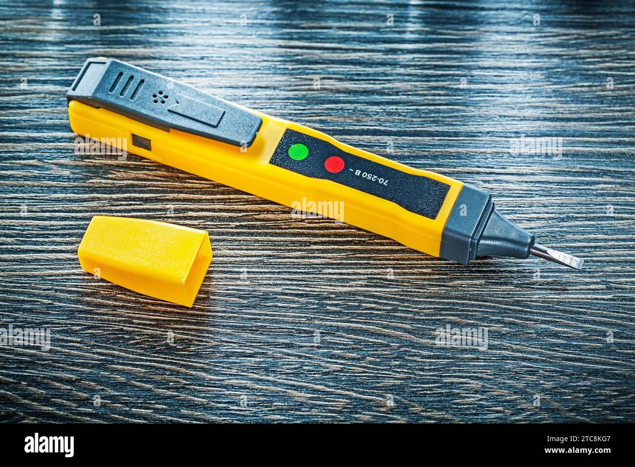 Electric tester on wood board horizontal image electricity concept ...