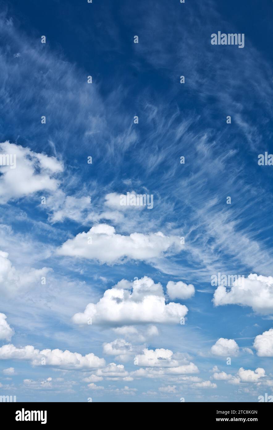 (Cumulus) and cirrus clouds Stock Photo - Alamy