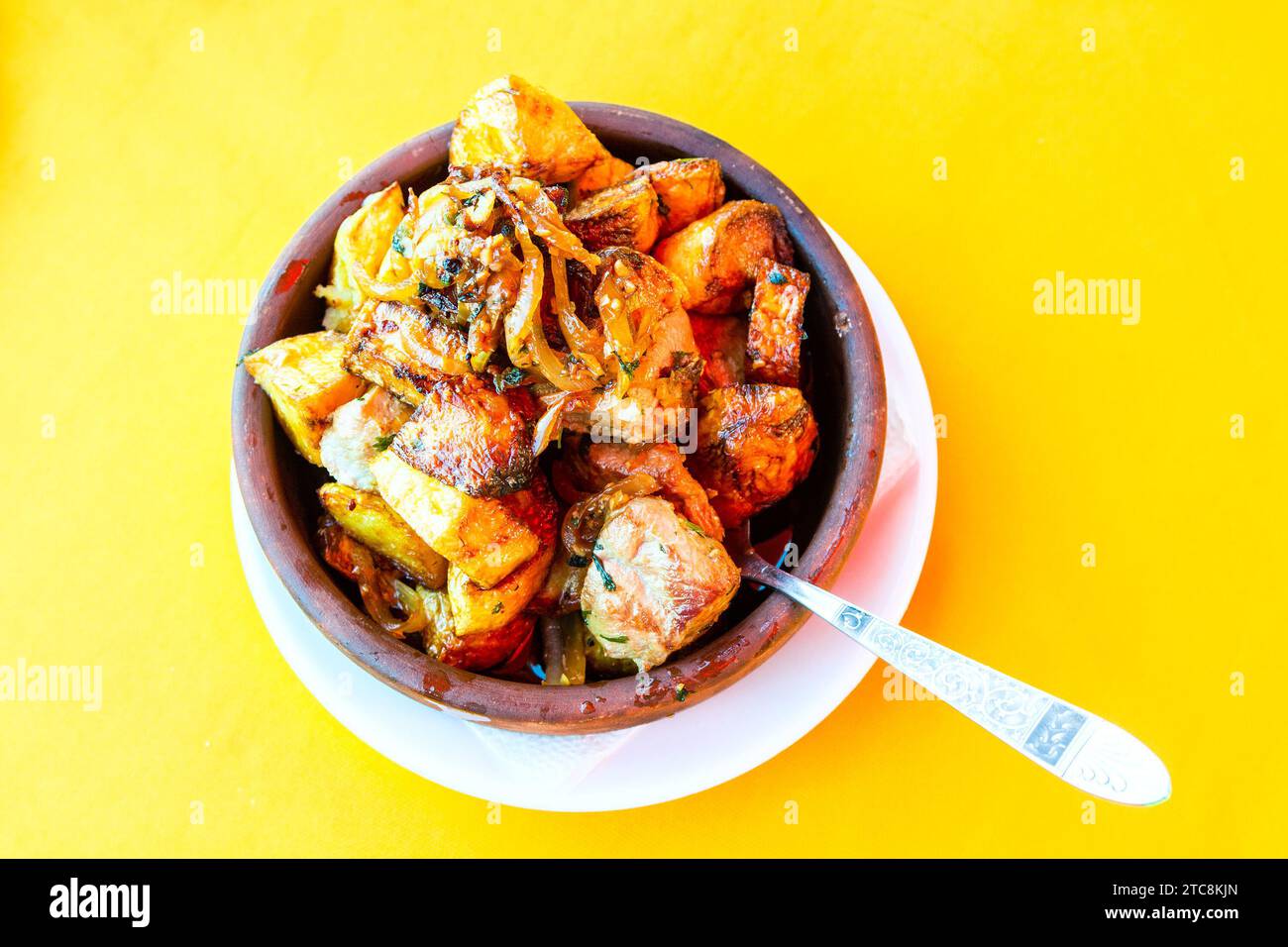 travel to Georgia - portion of Ojakhuri (Georgian dish from fried meat ...