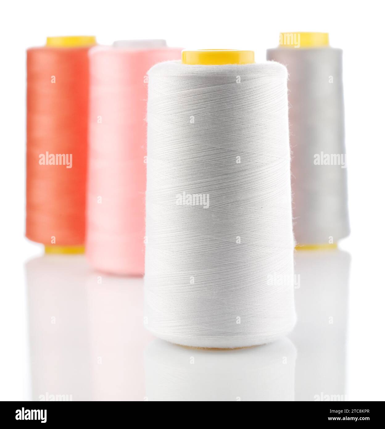 Composition of bobbins with stings Stock Photo - Alamy