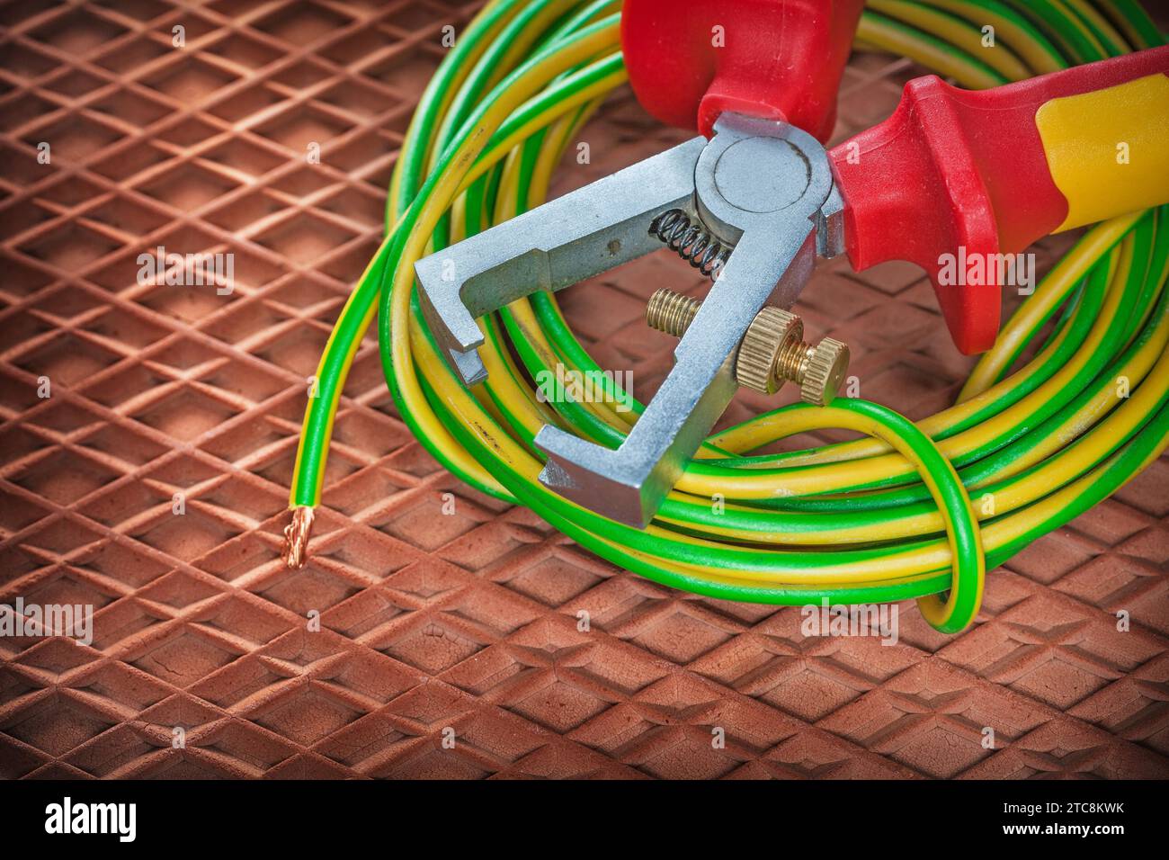 Insulation strippers electric wire on dielectric mat Stock Photo - Alamy