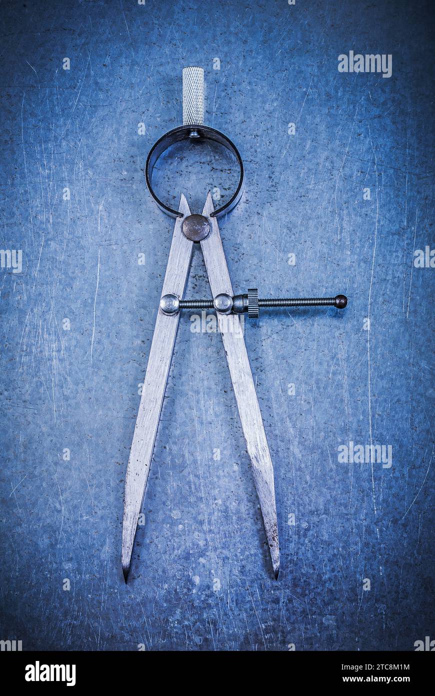 Metal construction divider on metallic background Stock Photo - Alamy