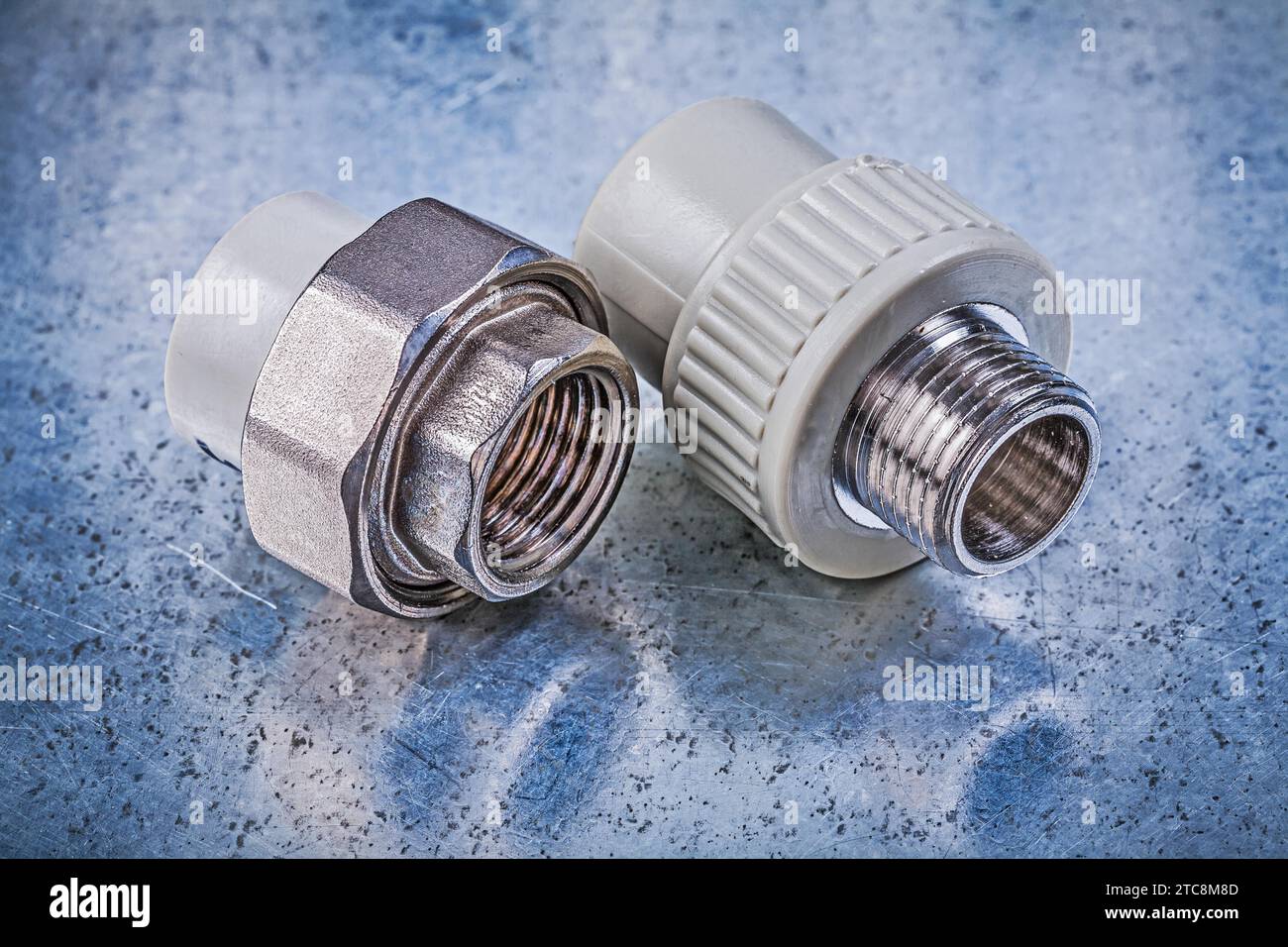 Screw-thread pipe connectors on metallic background construction ...