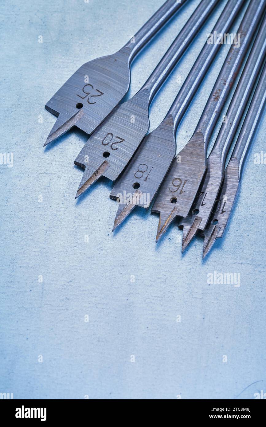 Spade bits for drilling wood on metallic background construction ...