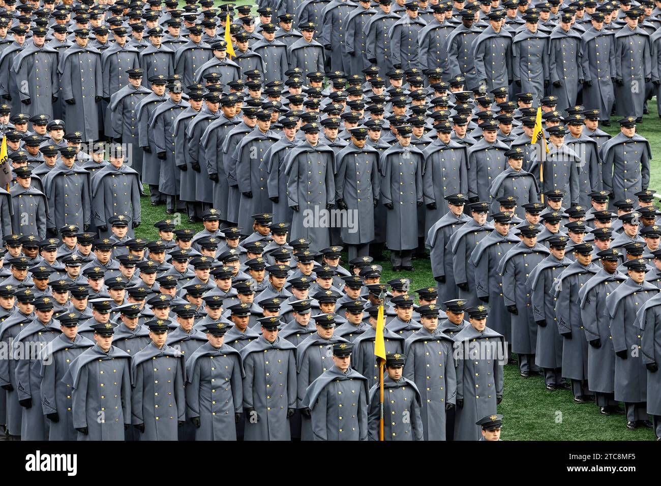 Formations of Army Cadets stand at attention before an NCAA football ...