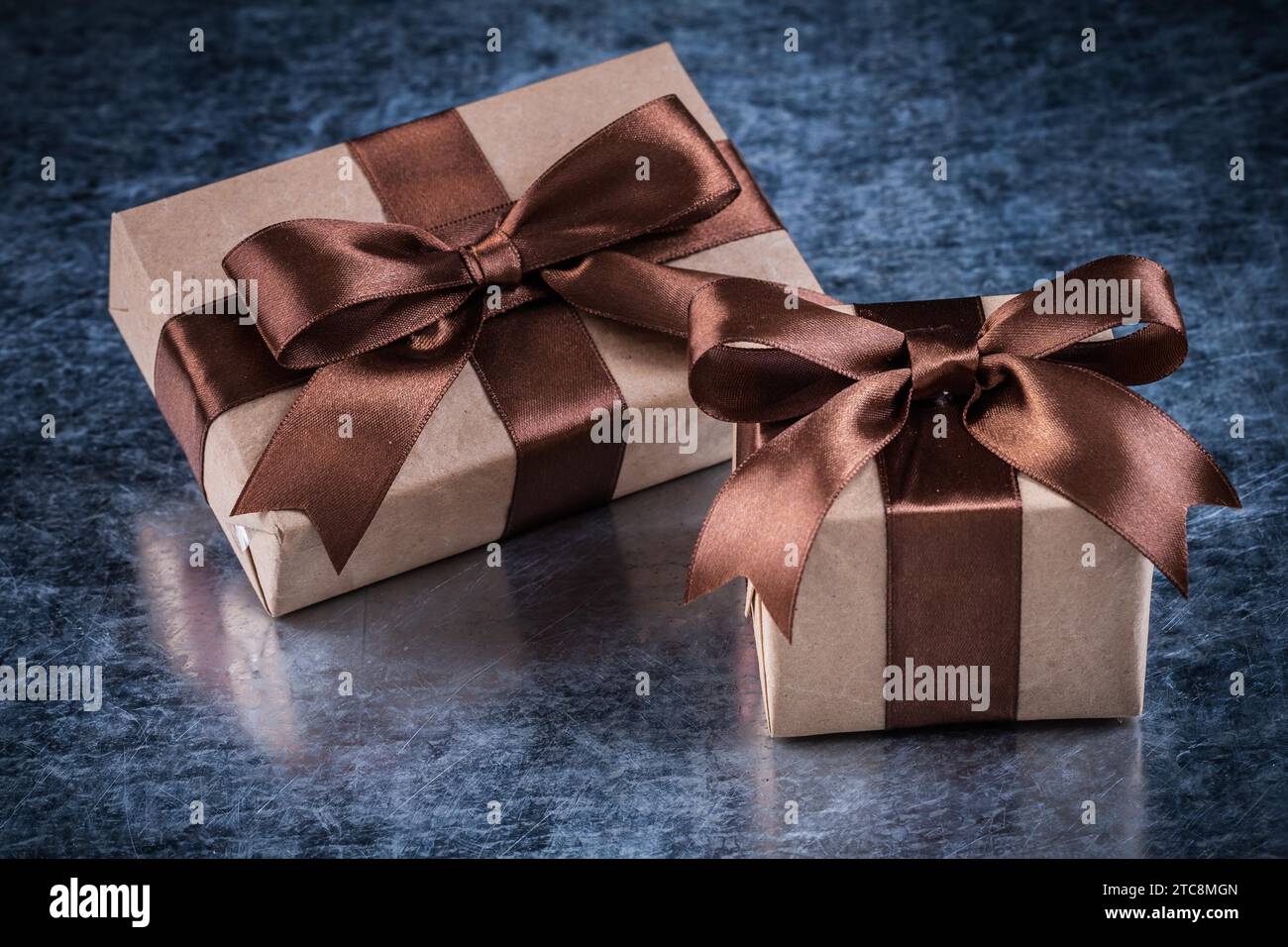 Vintage giftbox with present tape on metallic background holiday ...