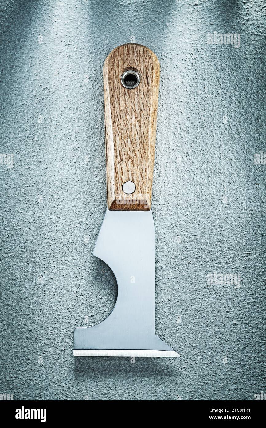 Construction spatula on concrete surface directly above building ...