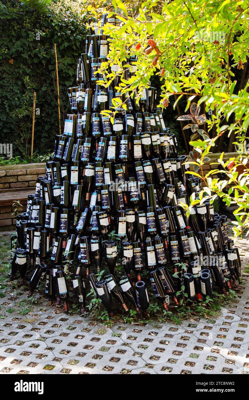 Telavi, Georgia - September 24, 2023: tree pyramid made from empty wine ...